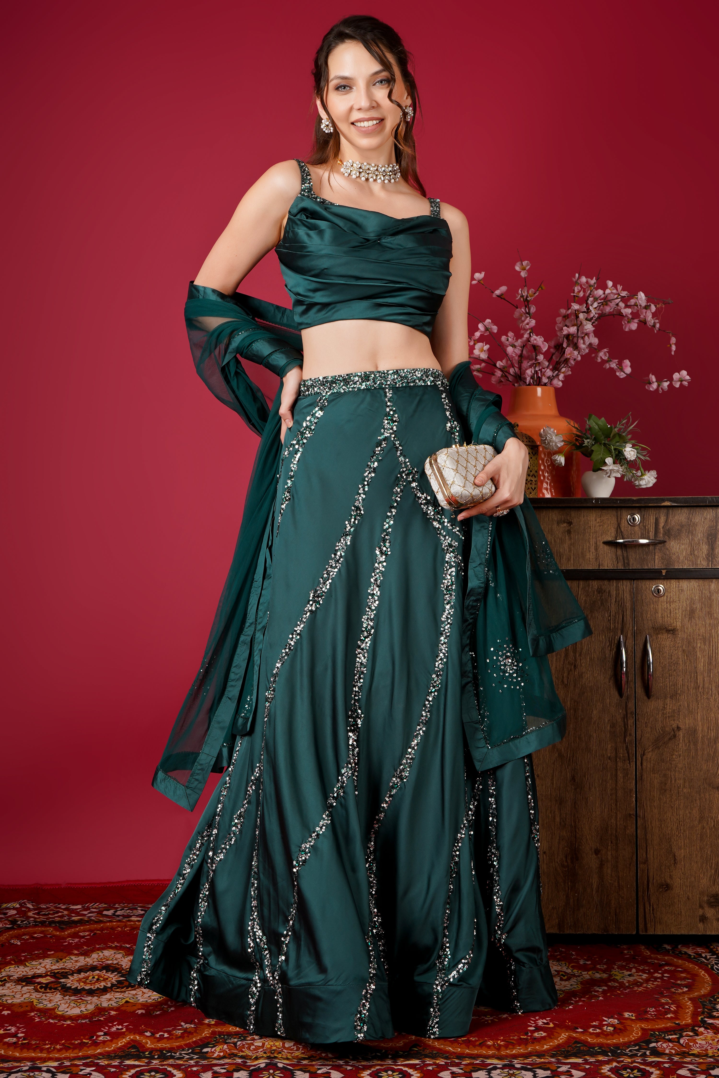 Lehenga set in bottle green with silk drape and sequin embellishments ...