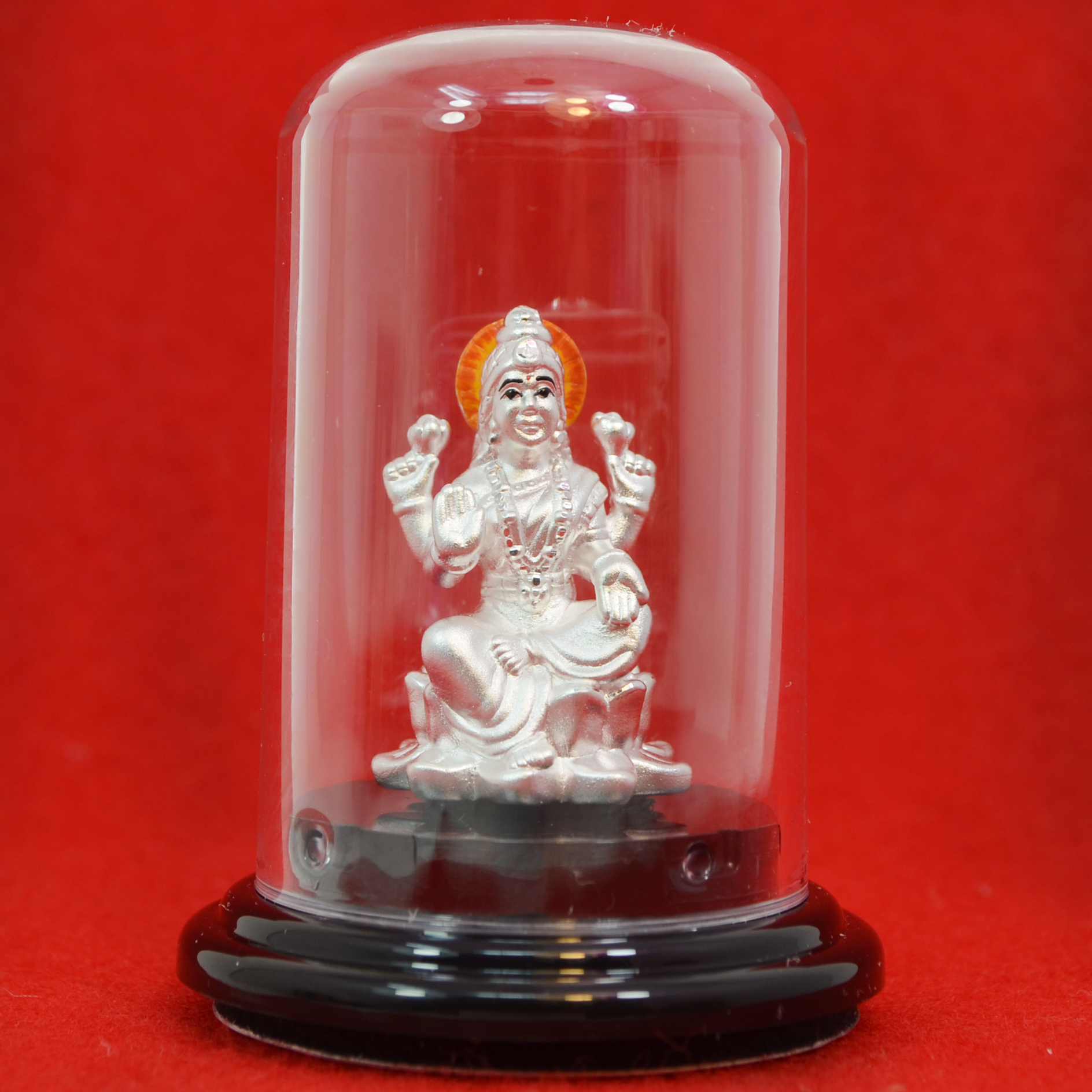 999 Pure Silver Small Lakshmi Idol with Orange Headrest in Circular Ba ...